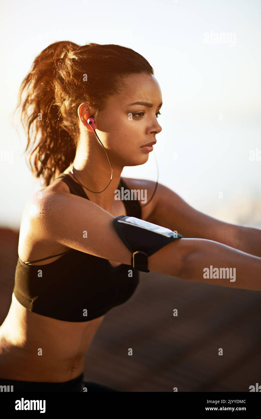 Getting stronger each day. a young woman taking a break from her ...