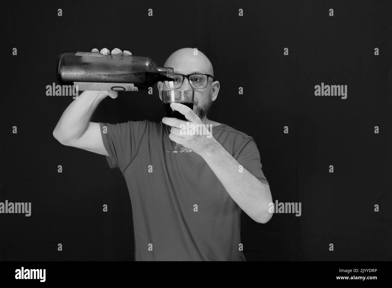 Holding juice Black and White Stock Photos & Images - Alamy