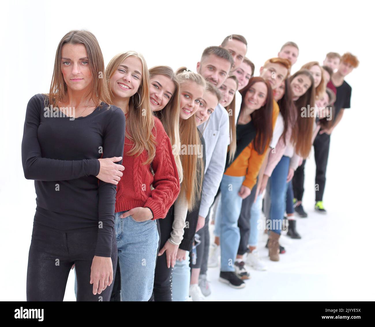 group of happy young people standing in line Stock Photo - Alamy