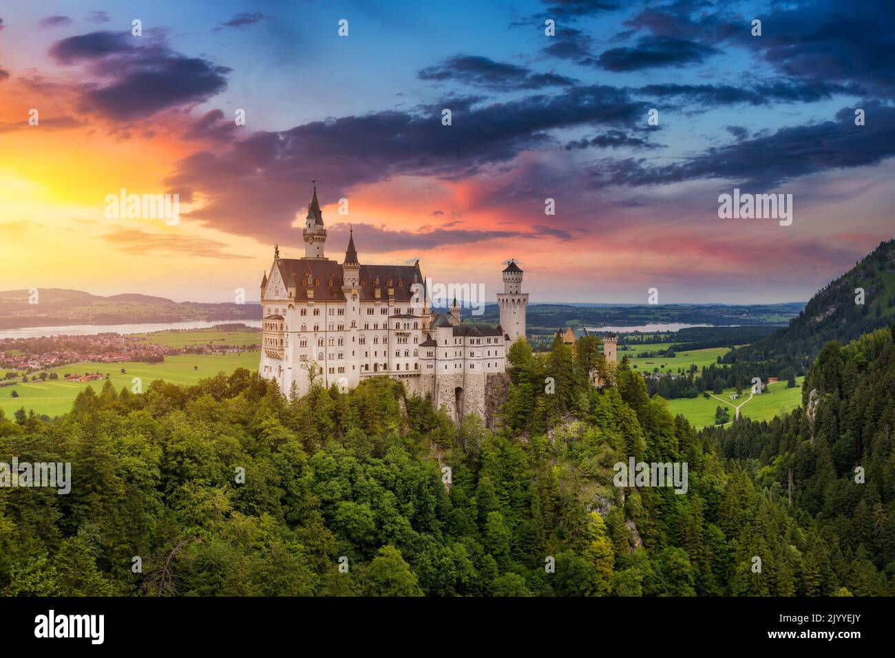 Famous Neuschwanstein Castle with scenic mountain landscape near Fussen ...