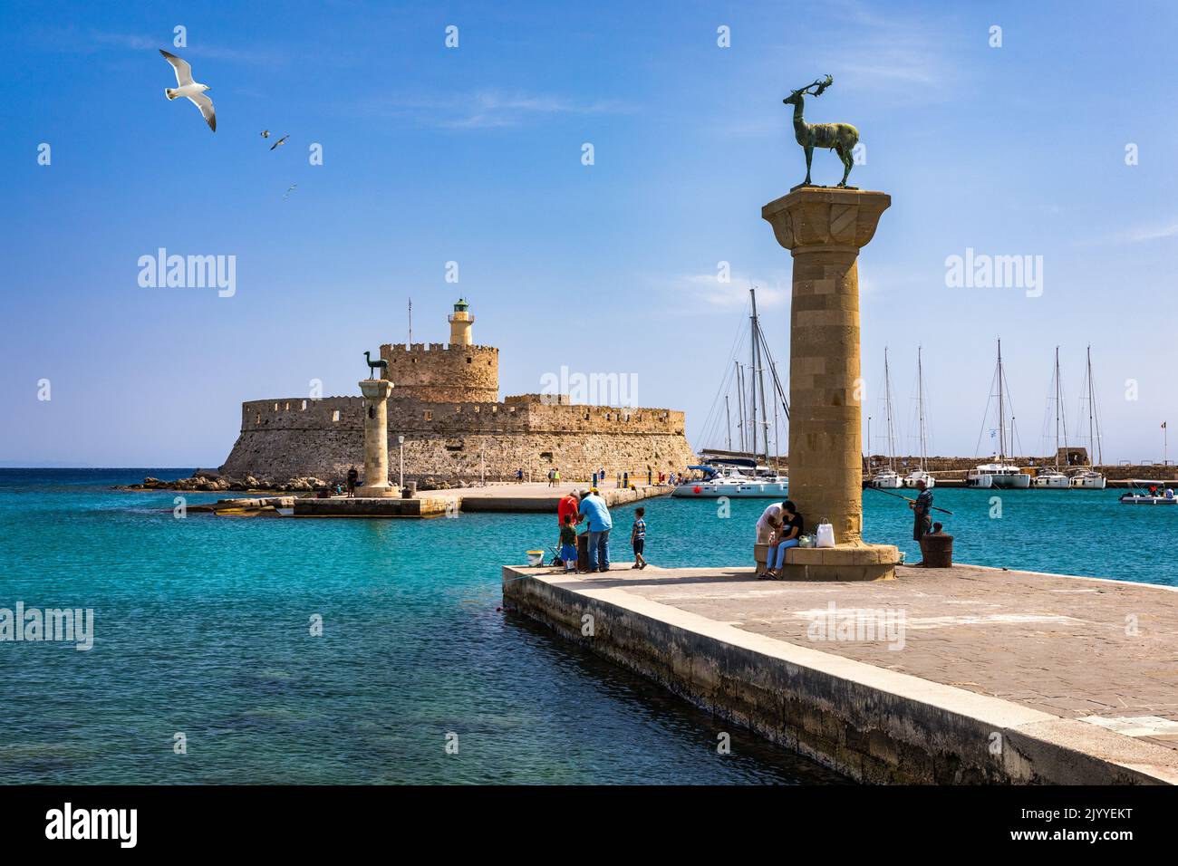 Mandraki port with deers statue, where The Colossus was standing and ...