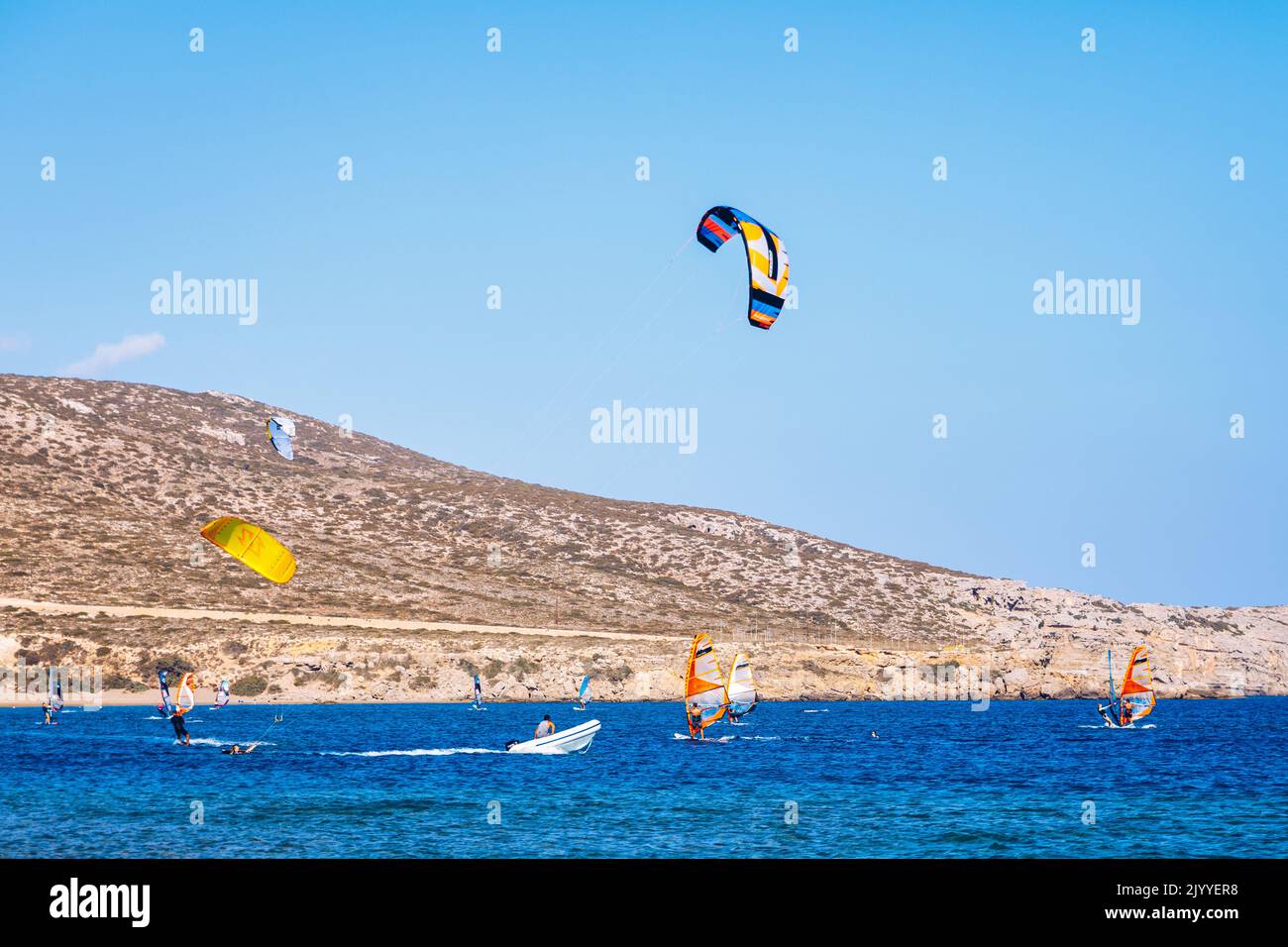 Surfers in Prasonisi Beach in Rhodes island, Greece. Kiteboarder ...
