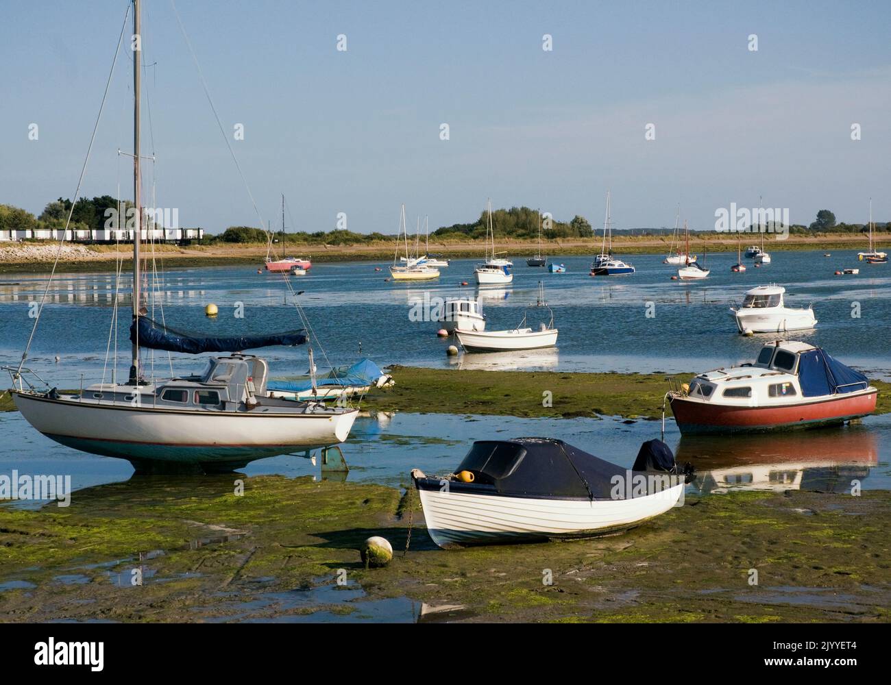 Low tide view of boats at Emsworth harbour Stock Photo - Alamy