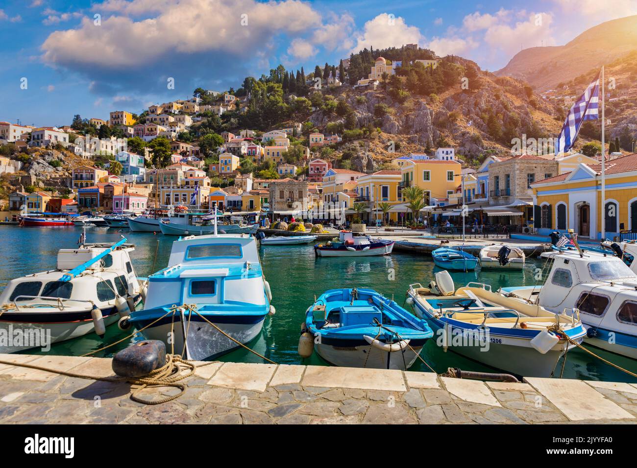 View of the beautiful greek island of Symi (Simi) with colourful houses ...