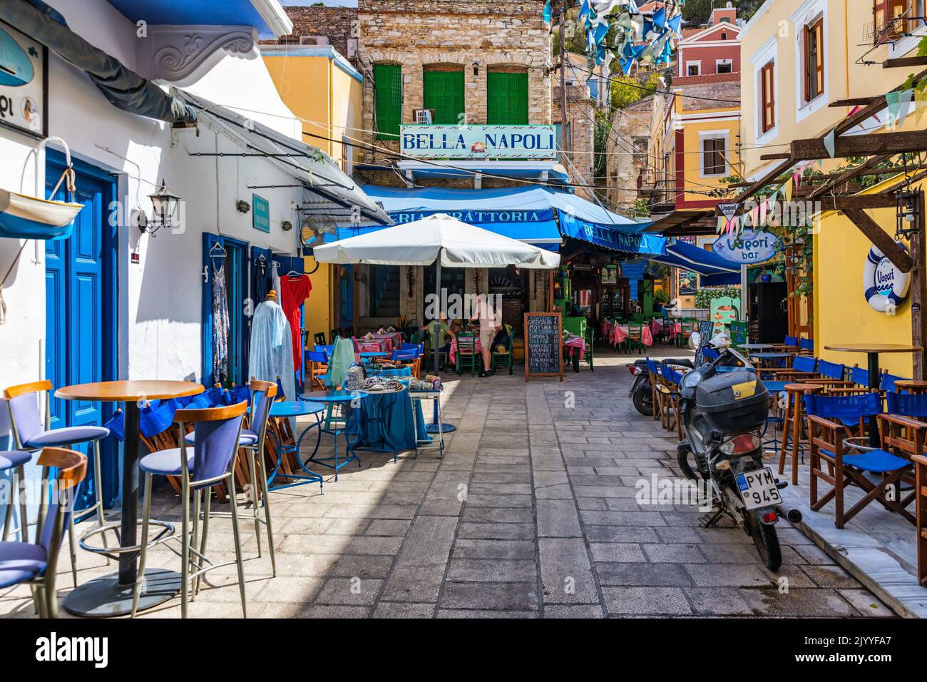 View of the beautiful greek island of Symi (Simi) with colourful houses ...