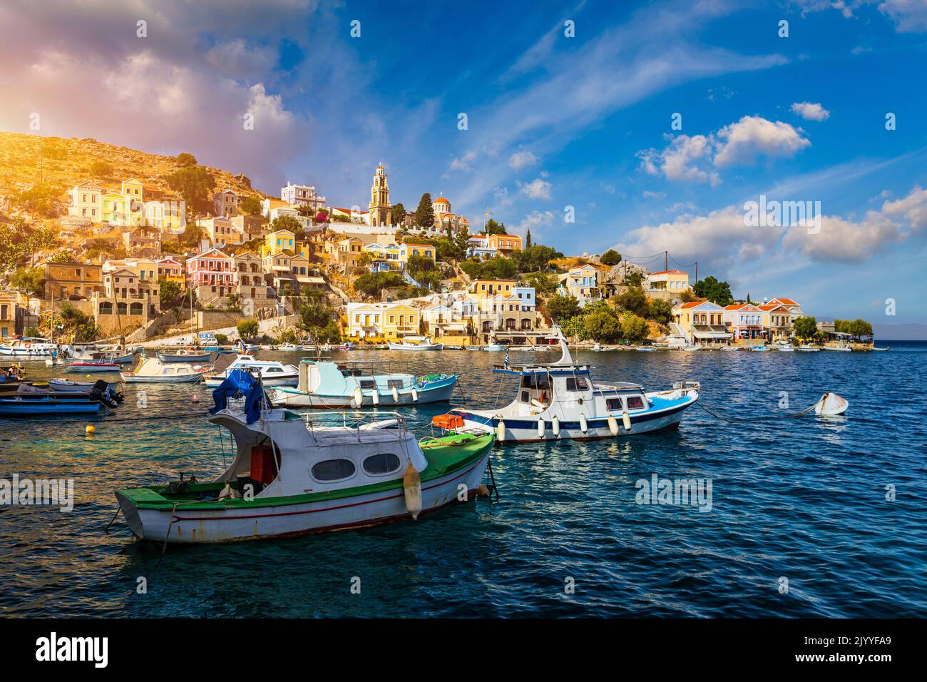 View on Symi (Simi) island harbor port, classical ship yachts, houses ...