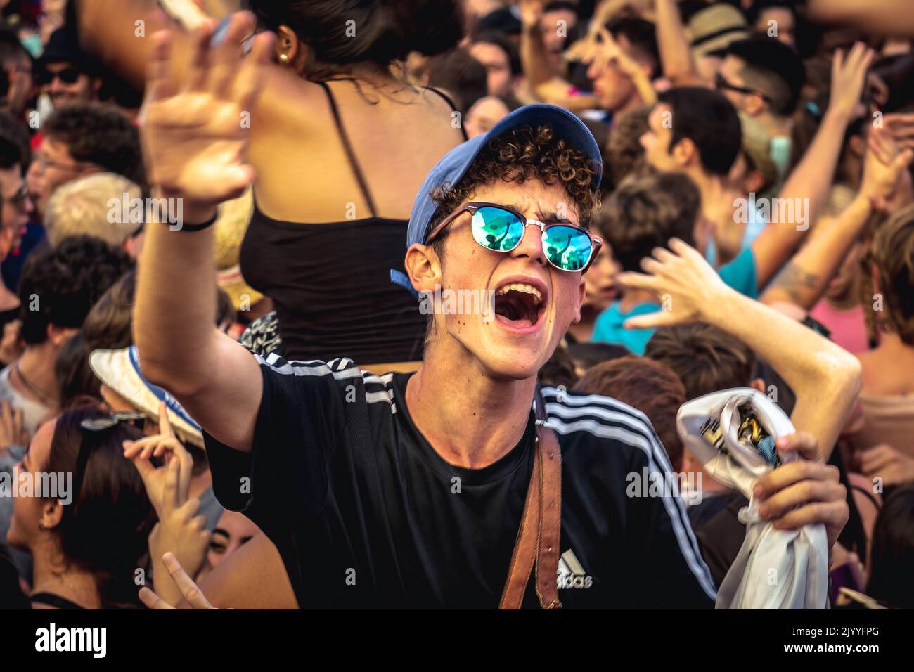 Mahon, Spain. 8th Sep, 2022. The cheering crowd dances during the ...