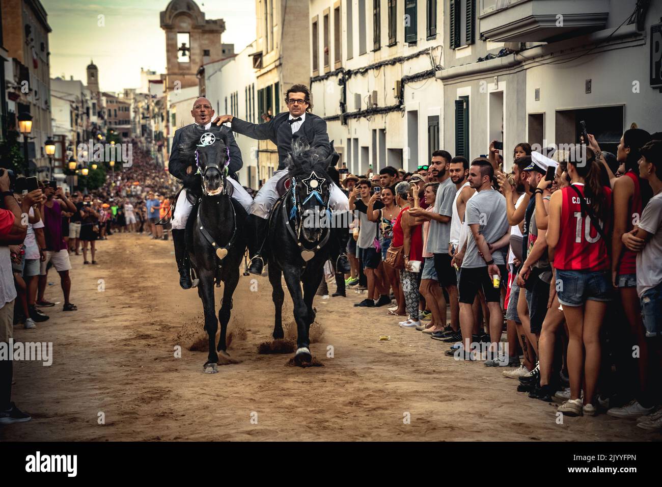 Mahon, Spain. 8th Sep, 2022. 'Caixers' (horse riders) ride in between ...