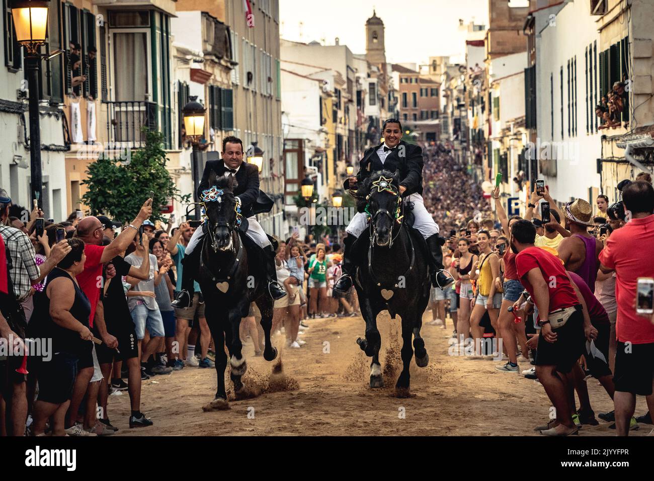 Mahon, Spain. 8th Sep, 2022. 'Caixers' (horse riders) ride in between ...