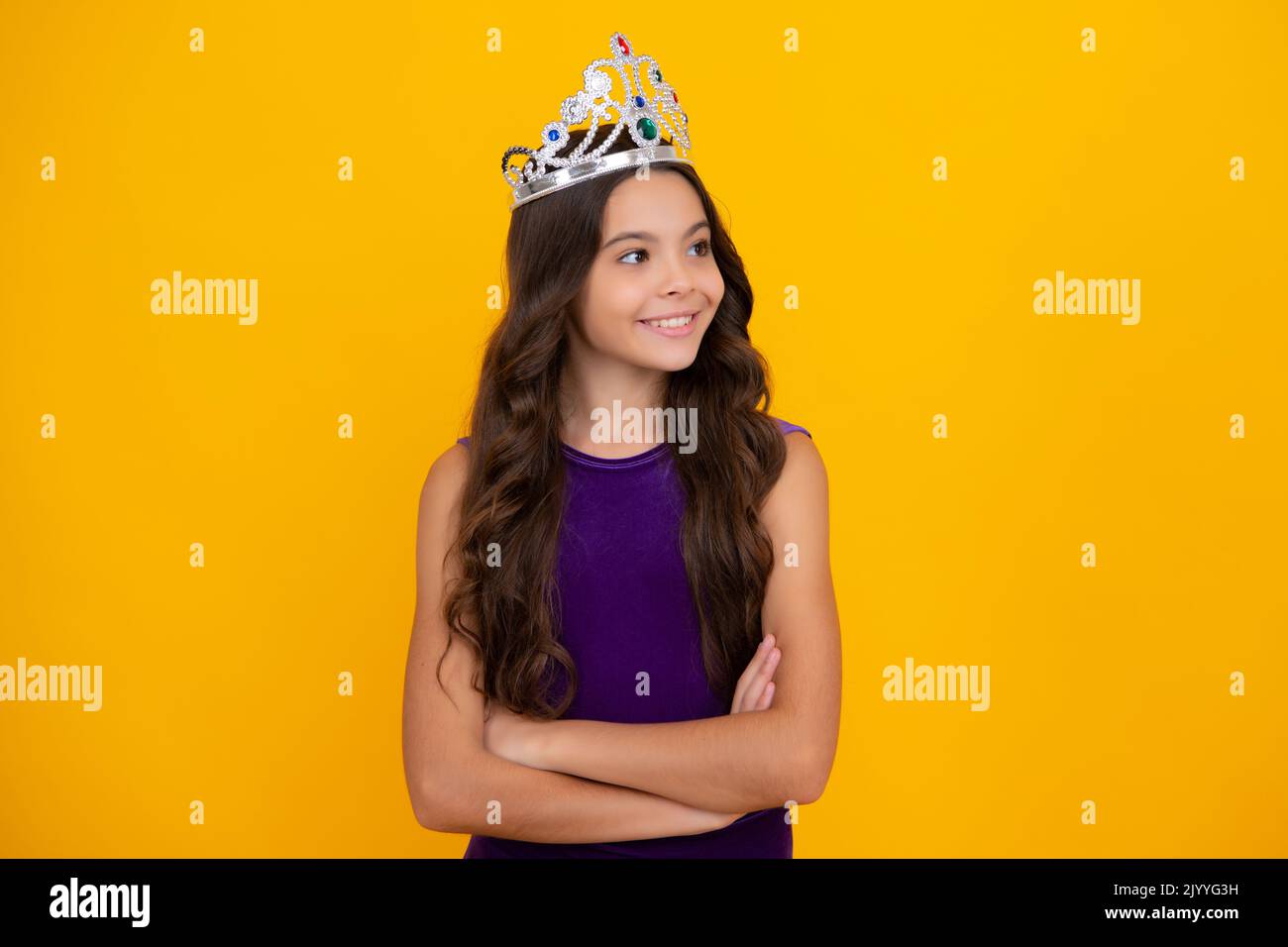 Portrait of ambitious teenage girl with crown, feeling princess ...