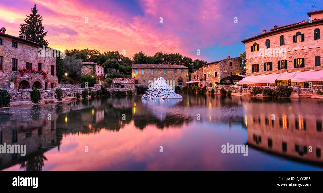 Thermal bath town of Bagno Vignoni, Italy during sunrise. Old thermal ...