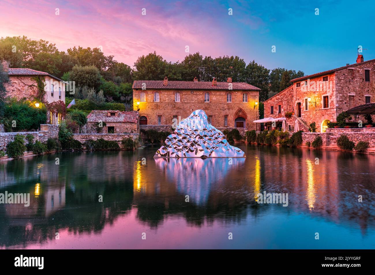 Thermal bath town of Bagno Vignoni, Italy during sunrise. Old thermal ...