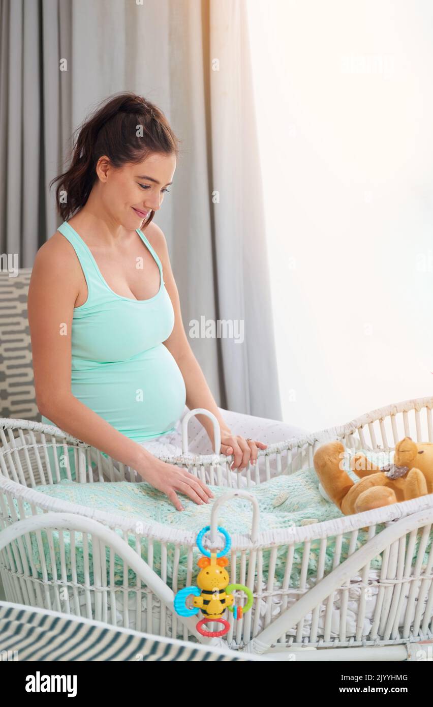 I cant wait to watch my baby sleep in here. an attractive young ...