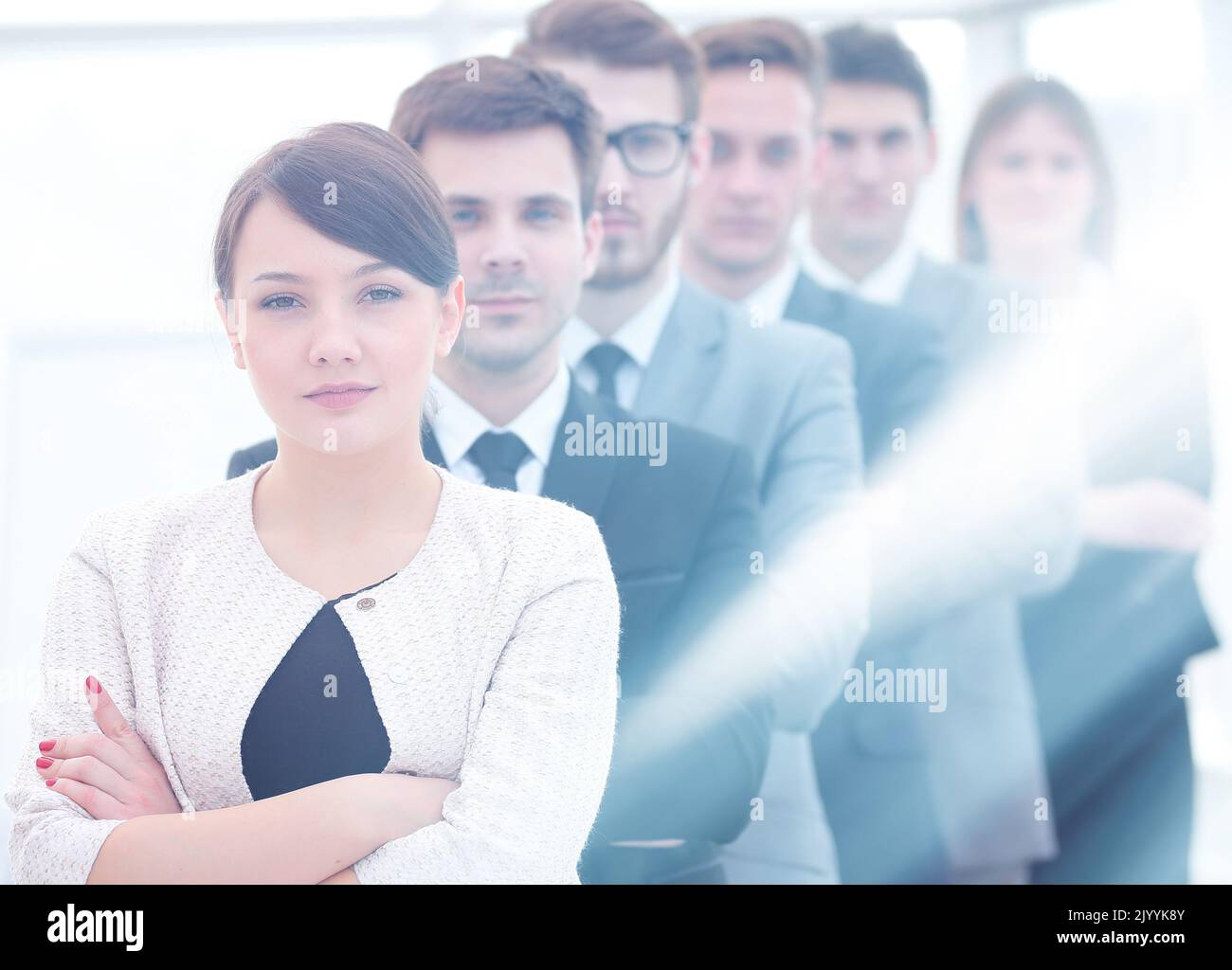successful business team with a female leader in front Stock Photo - Alamy