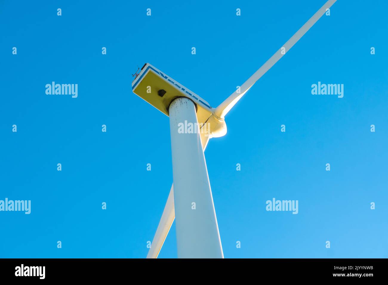 Wind generator on a blue sky background.Wind renewable energy. blades ...