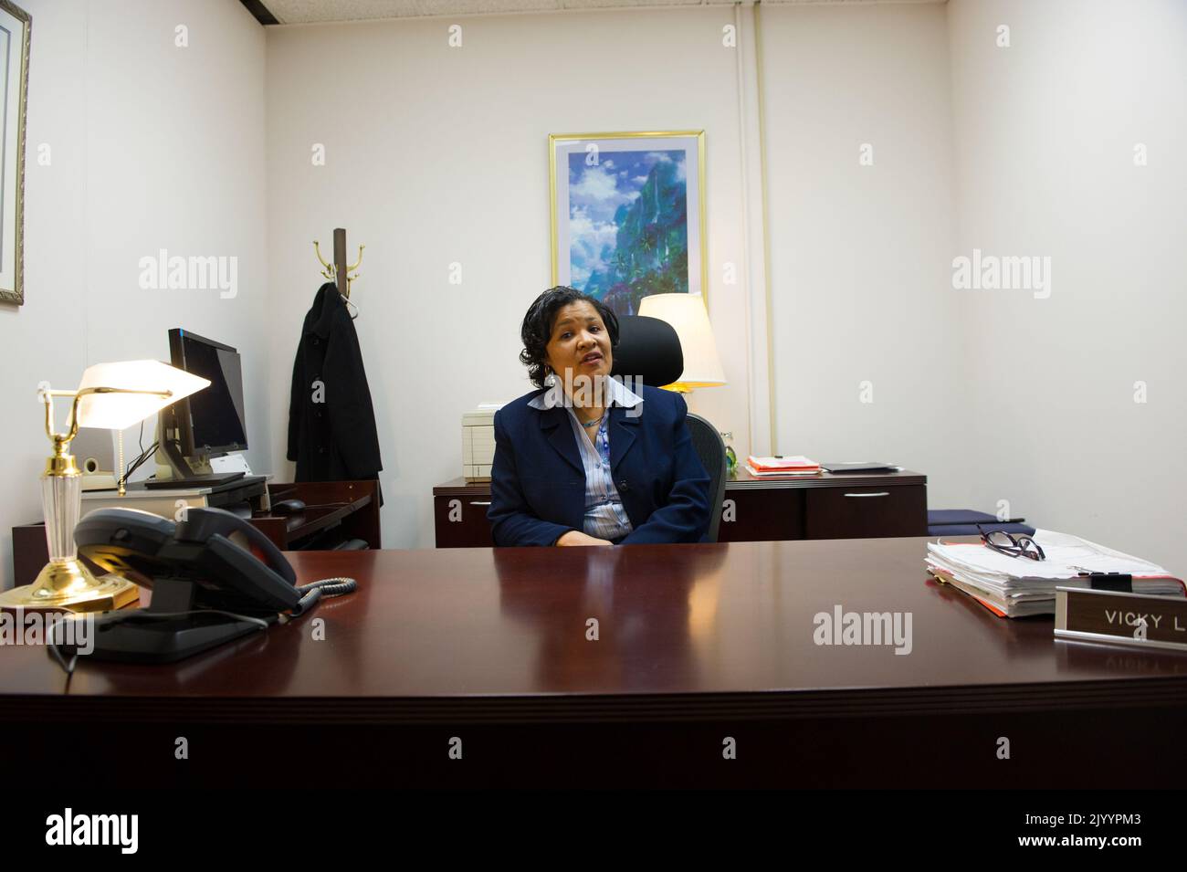 Desk shot of Vicky Lewis, Assistant Executive Secretary, Executive ...