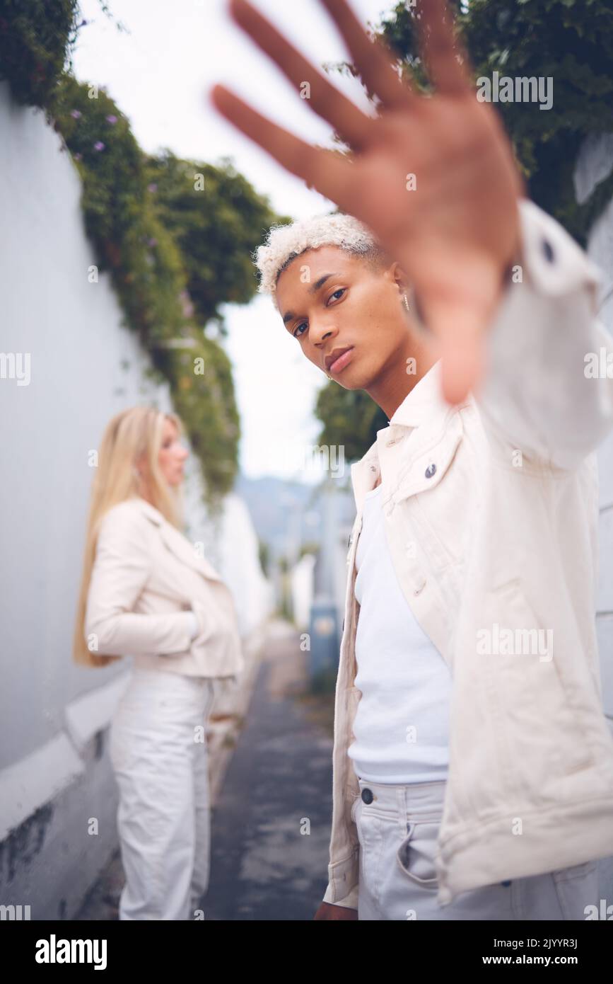 Fashion, model and gen z man from Guatemala in a alley outdoors pose ...