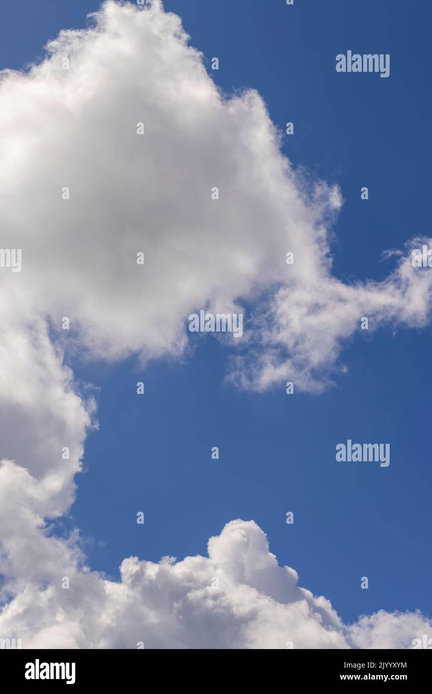 Clouds floating across the sky in the daytime, white clouds moving from ...