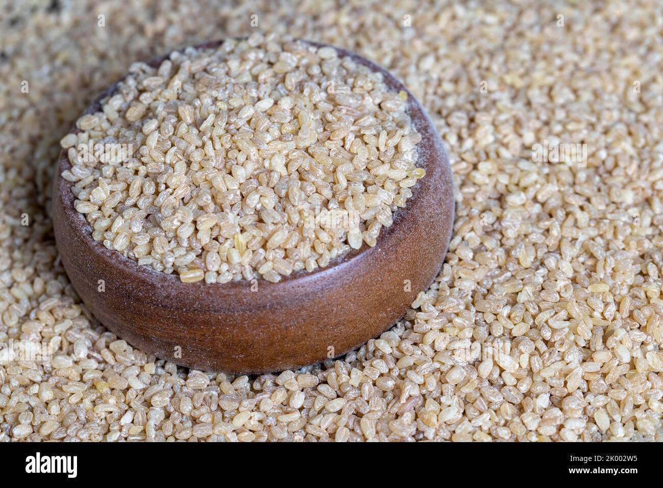 Fresh uncooked bulgur porridge on the table, cooking dishes from ...