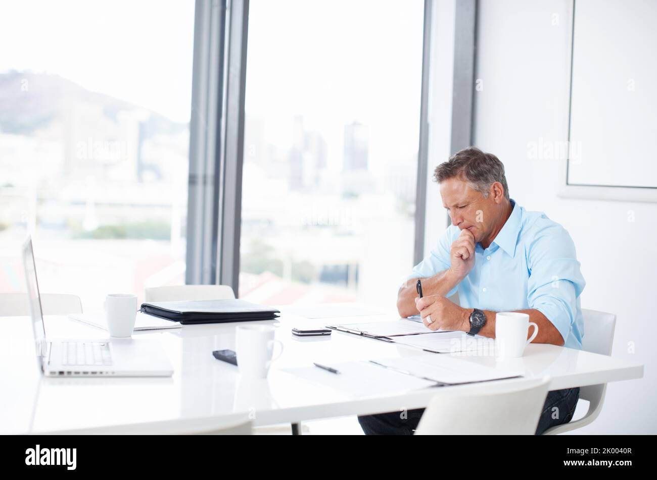 Dreaming up new creative ads. A mature advertising executive thinking ...