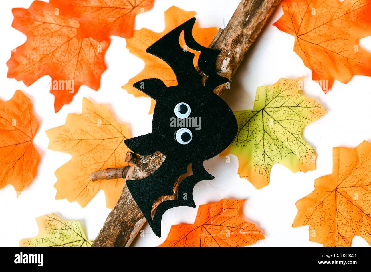 Autumn background. Autumn leaves and bat. Happy Halloween Stock Photo ...