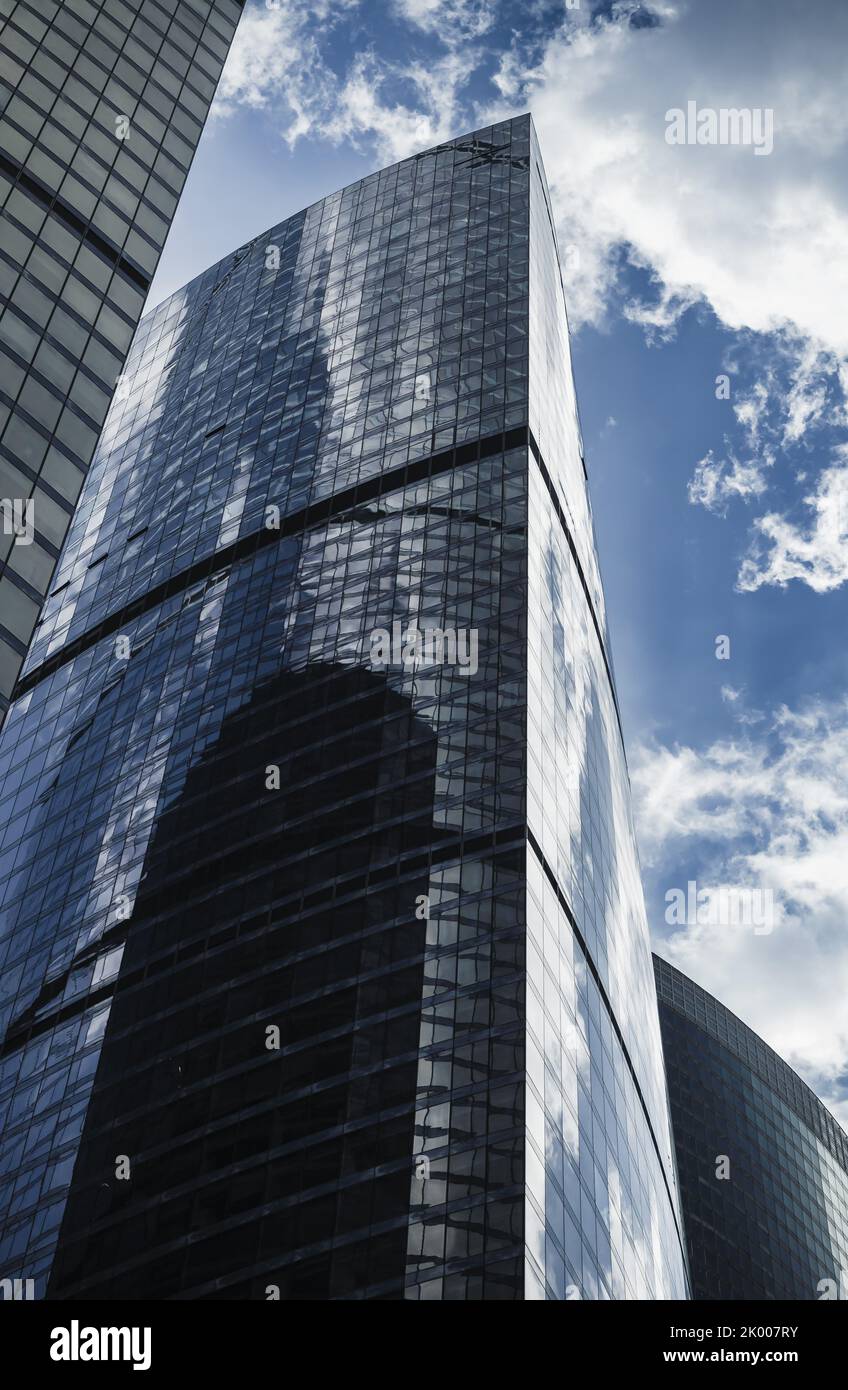 Selective focus, fragment of transparent glassy walls of skyscraper ...