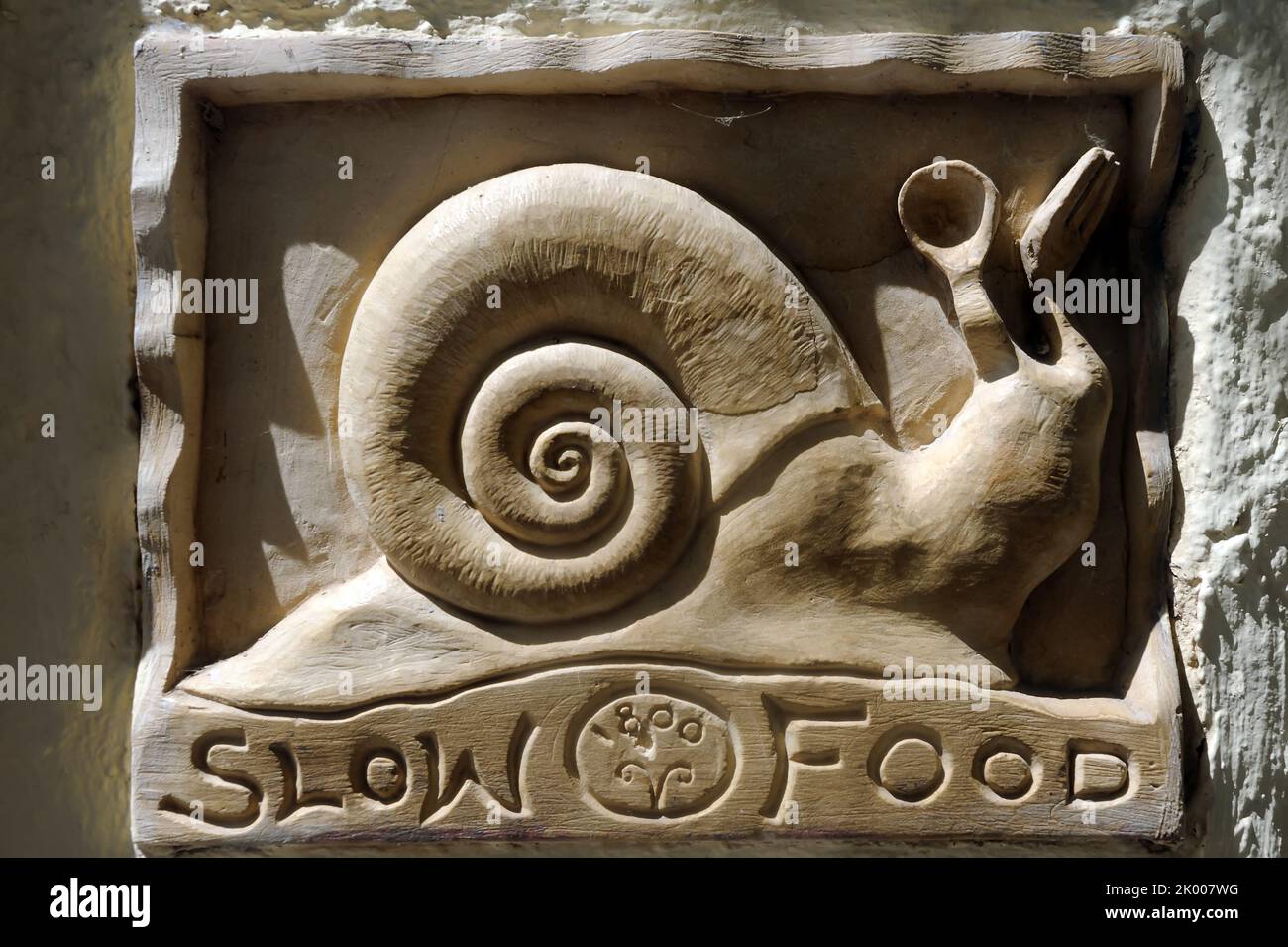 The signboard with slow food snail of the unidentified cafe of Oia on ...