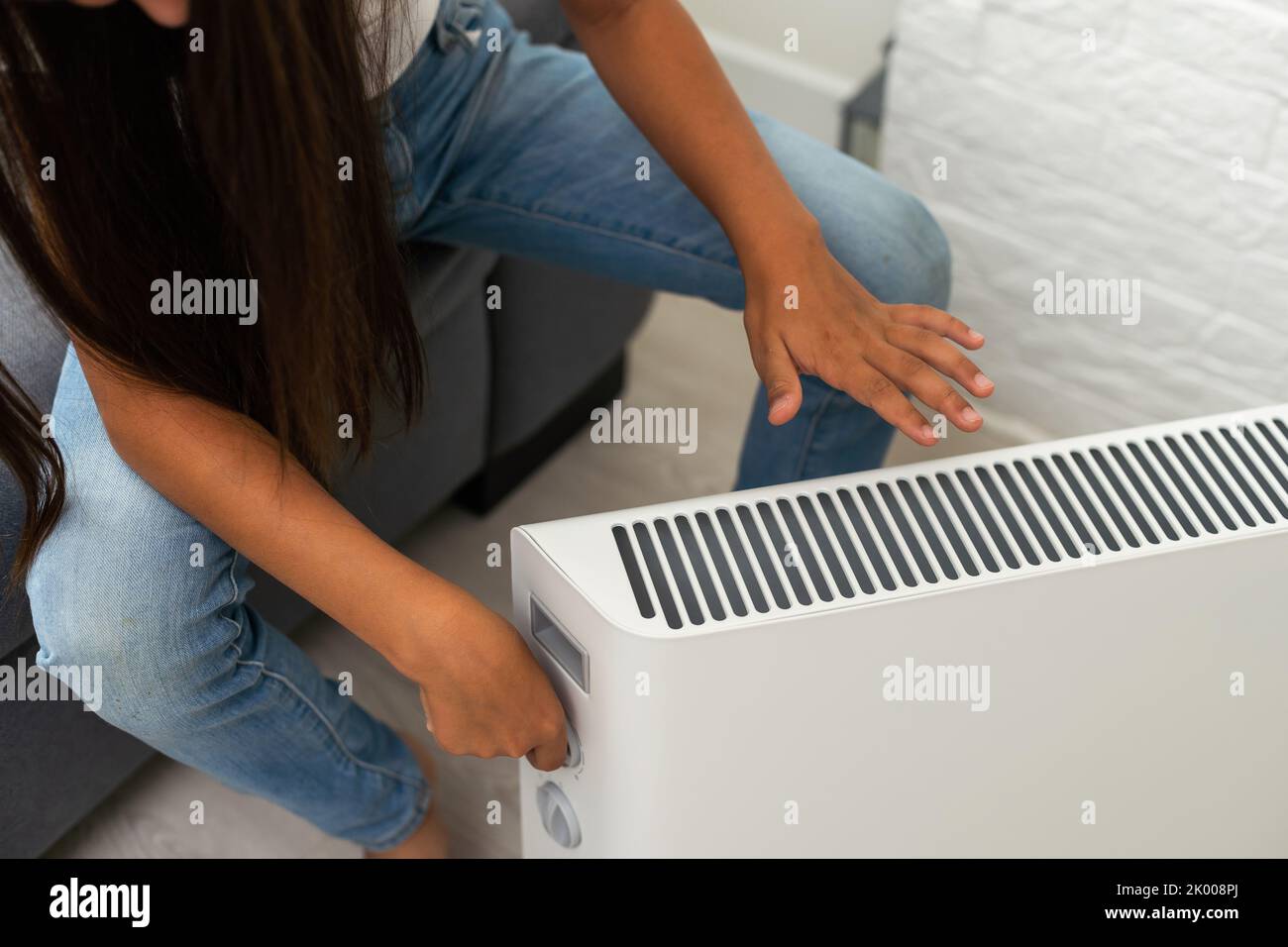 Child warming on heating radiator, closeup Stock Photo - Alamy