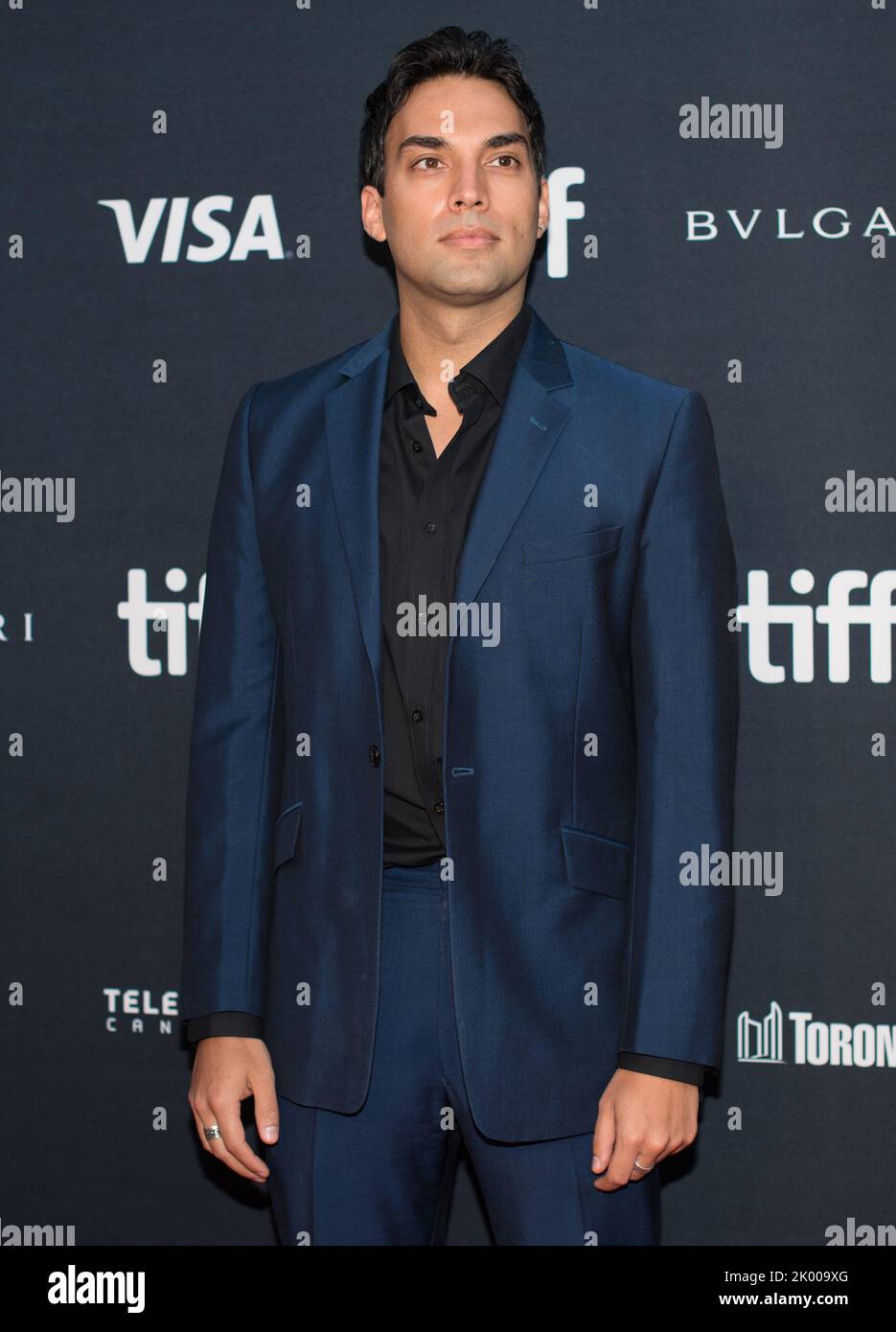 Actor James Floyd poses for a photograph on the red carpet for the film, The Swimmers, at Roy ...
