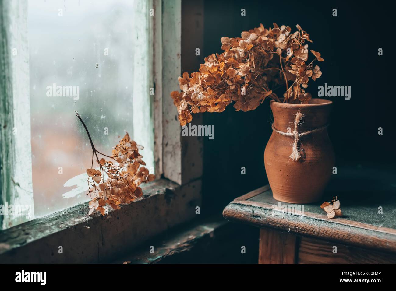still life in vintage style with retro objects, vase with flowers. High ...