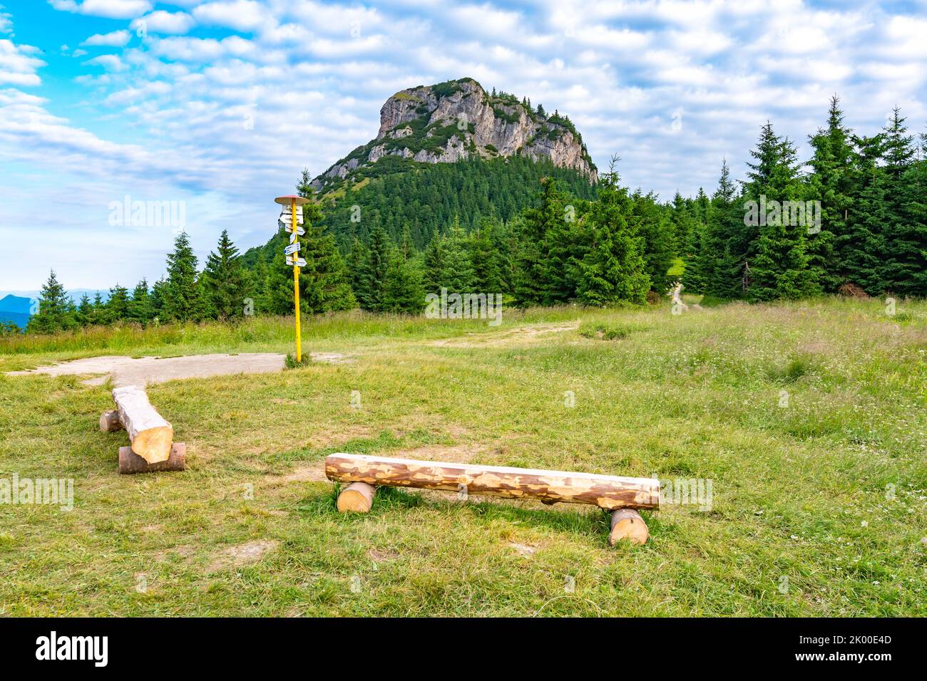 Tourist pointer placed on meadow near Maly Rozsutec mountain in ...