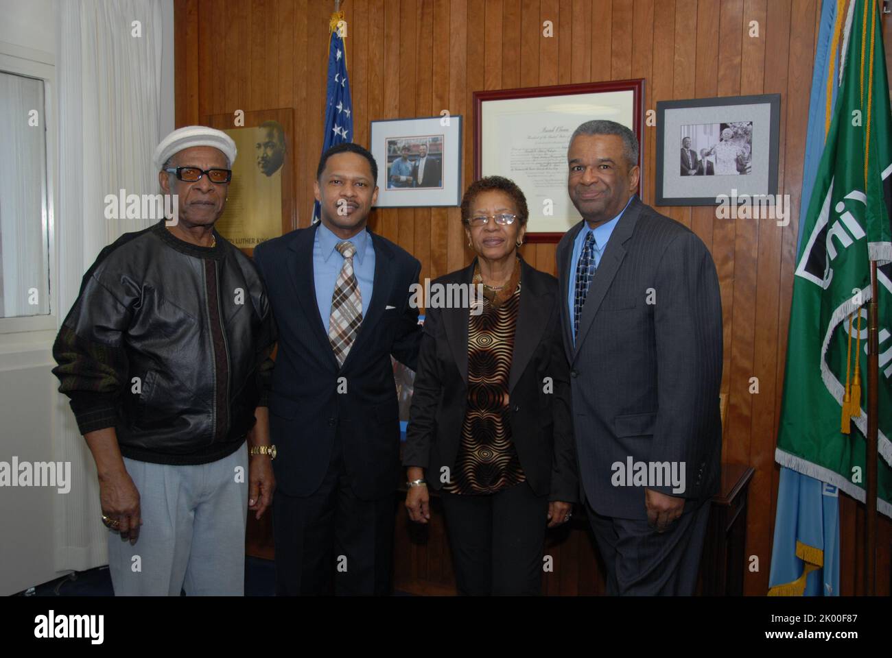 Deputy Secretary Ron Sims with Anthony Donald and family Stock Photo ...