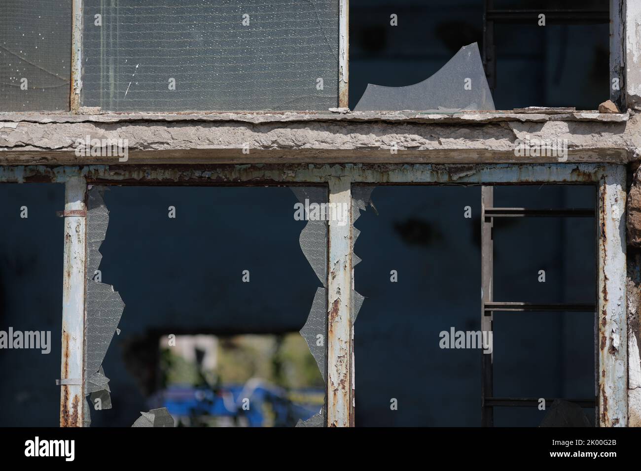 Broken walls and windows in an abandoned industrial building Stock ...