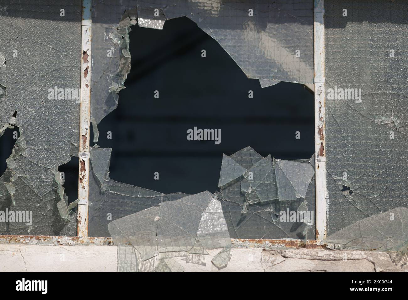 Broken walls and windows in an abandoned industrial building Stock Photo - Alamy