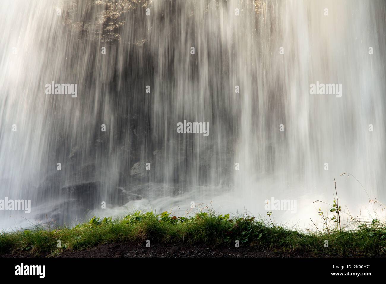 Waterfall in a mighty river in the woodland, mountain. Rocks, cliffs ...