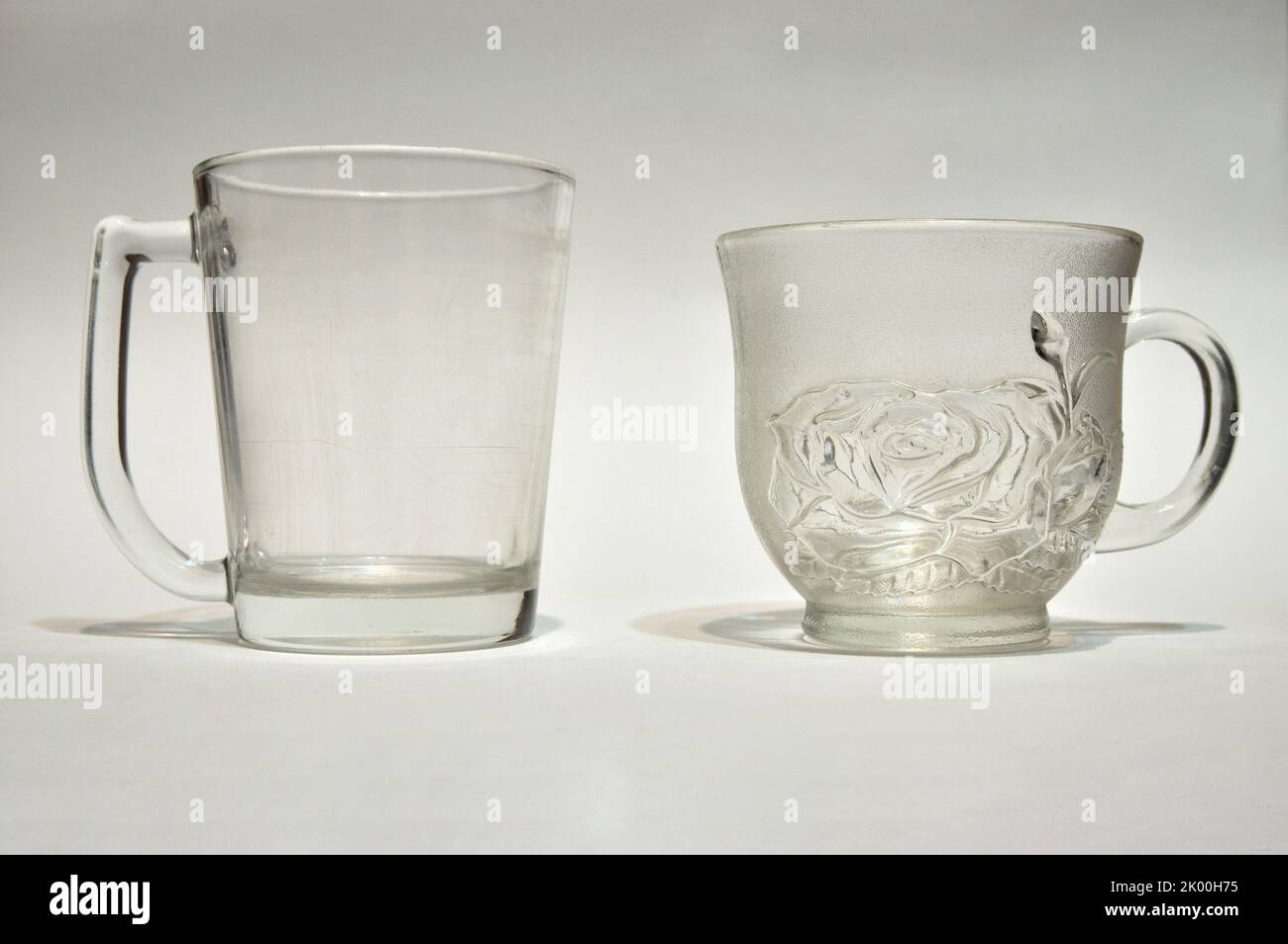 Empty cups, Two used glasses on white background, Transparent glass ...
