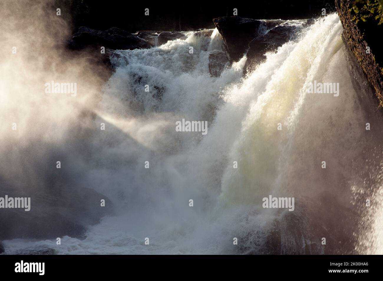 Waterfall in a mighty river in the woodland, mountain. Rocks, cliffs ...