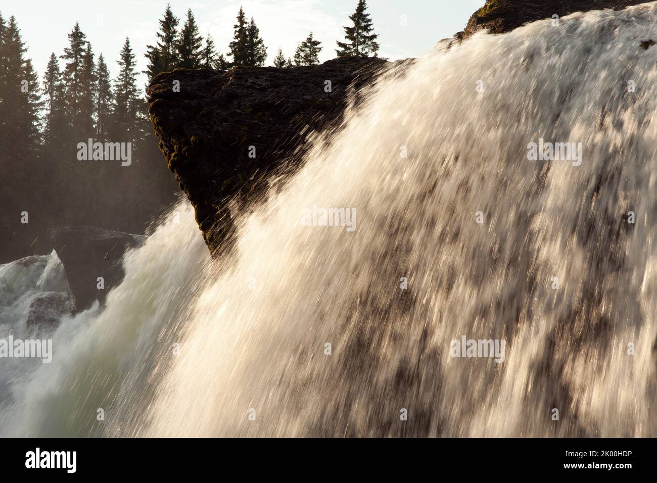 Waterfall in a mighty river in the woodland, mountain. Rocks, cliffs ...
