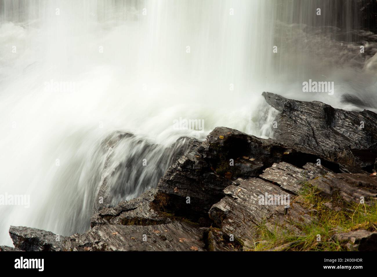 Waterfall in a mighty river in the woodland, mountain. Rocks, cliffs ...