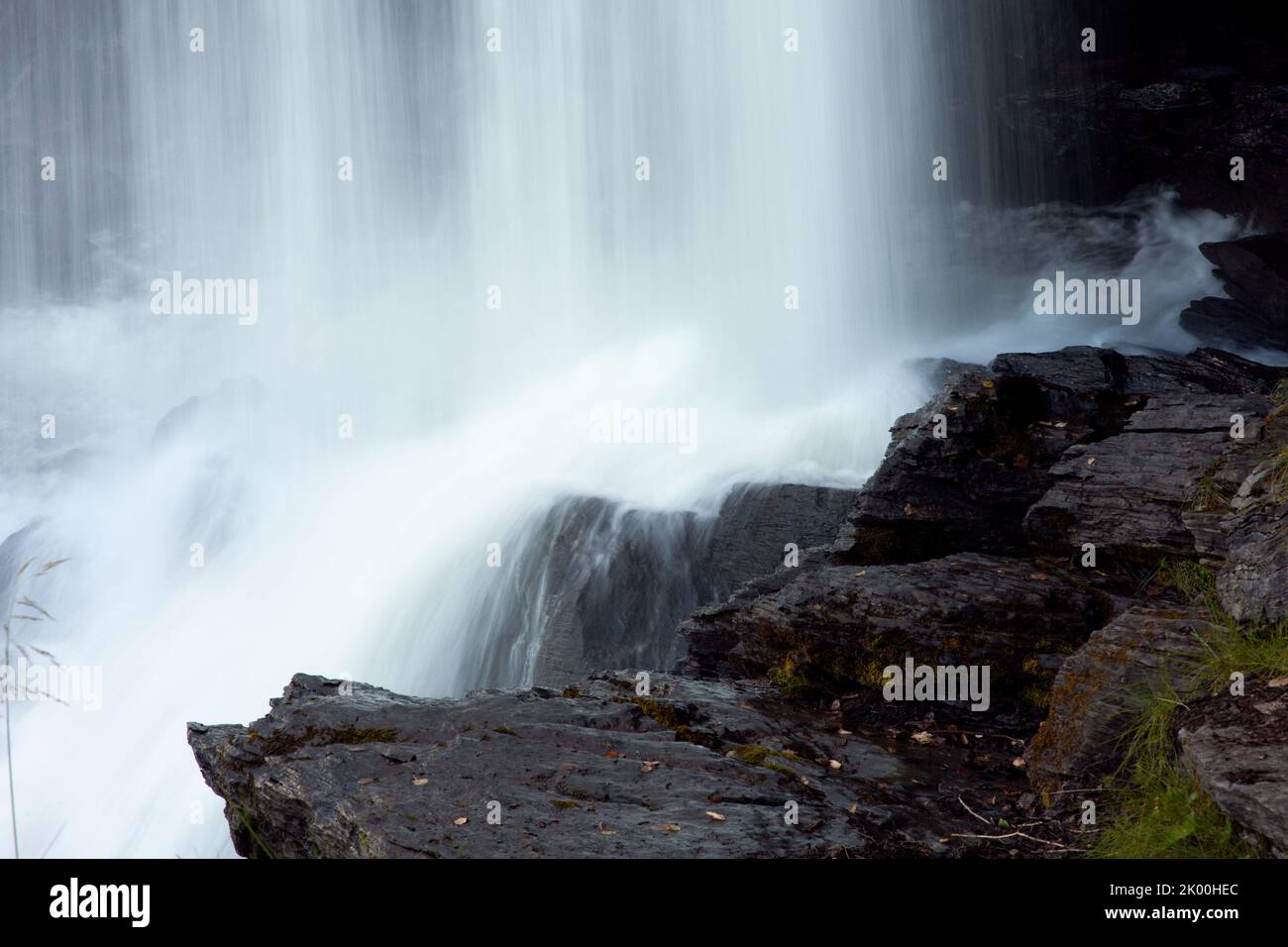 Waterfall in a mighty river in the woodland, mountain. Rocks, cliffs ...