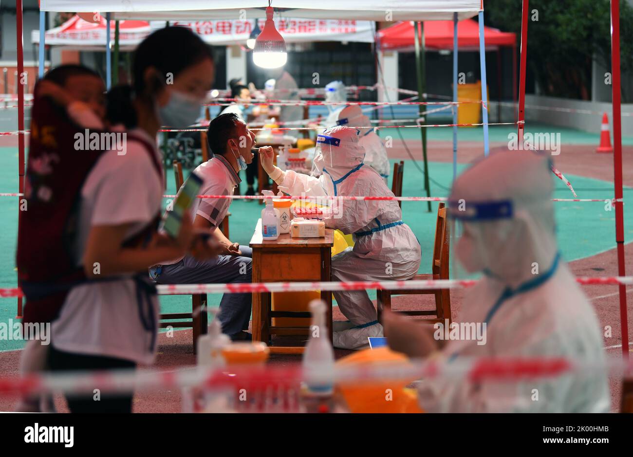 GUIYANG, CHINA - SEPTEMBER 9, 2022 - Medical staff take nucleic acid ...