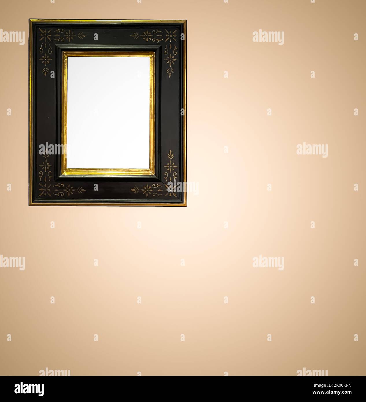 Antique art fair gallery frame on beige wall at auction house or museum ...