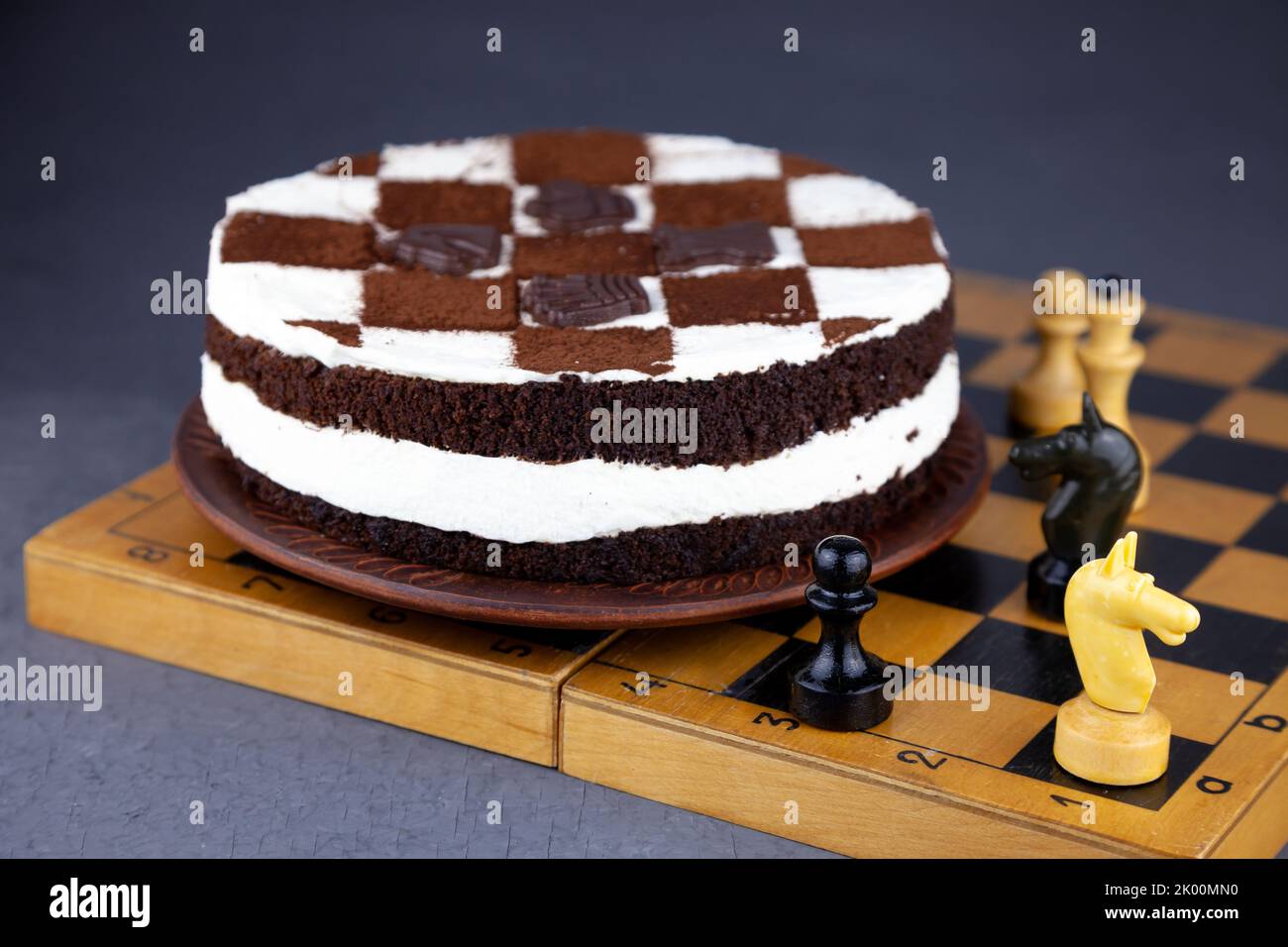 Sponge cake with butter cream. Cake in the form of a chessboard. A gift ...