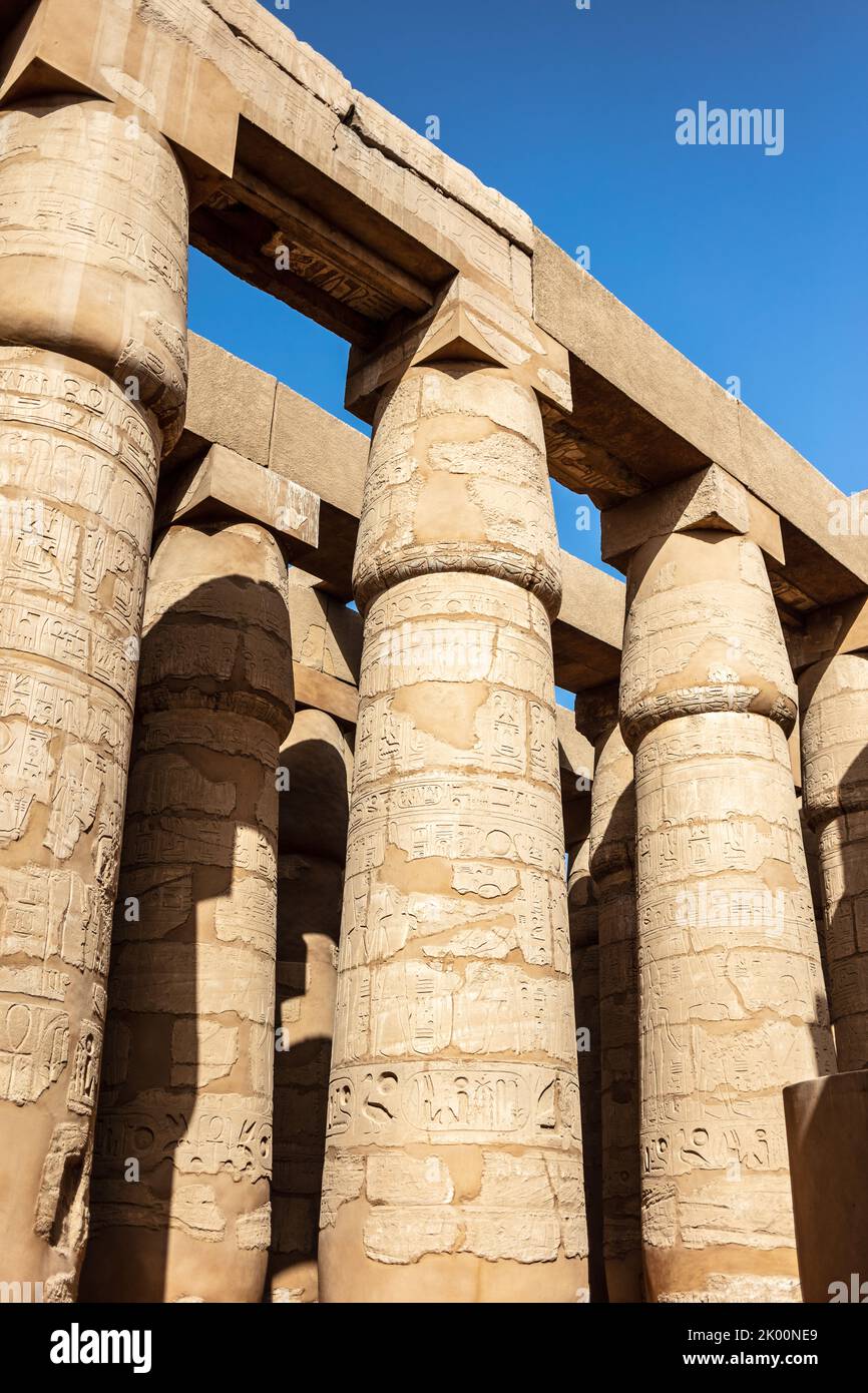 Different hieroglyphs on the walls and columns in the Karnak temple. Karnak temple is the ...