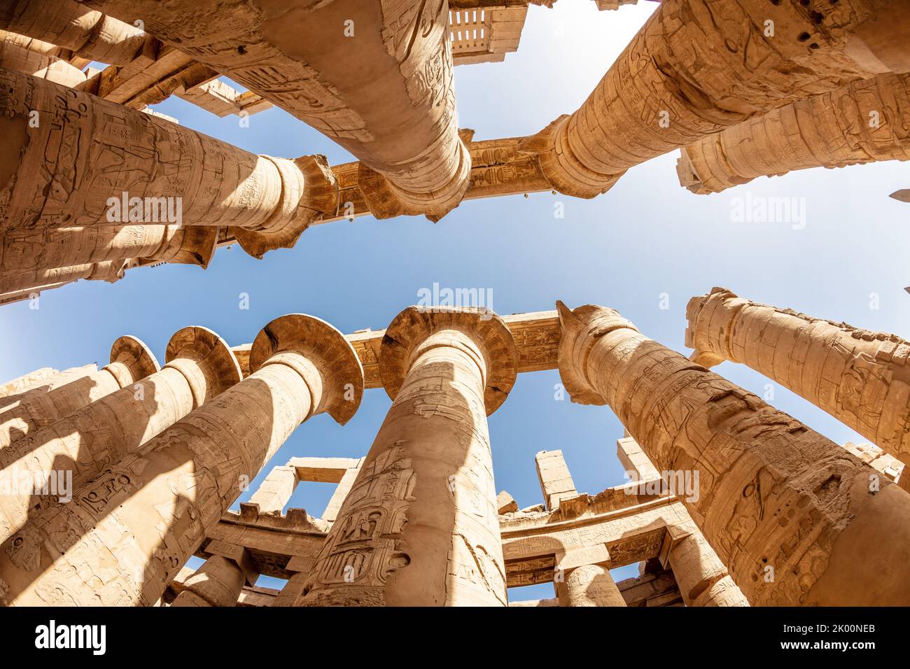 Different hieroglyphs on the walls and columns in the Karnak temple. Karnak temple is the ...