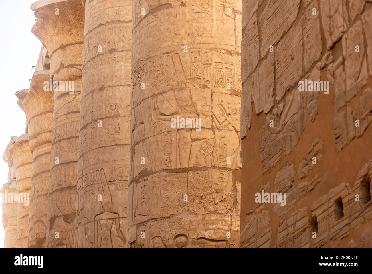 Different hieroglyphs on the walls and columns in the Karnak temple. Karnak temple is the ...
