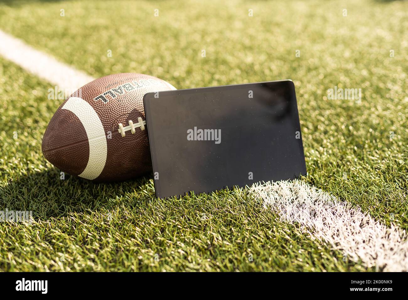 Football player holding money hi-res stock photography and images - Alamy