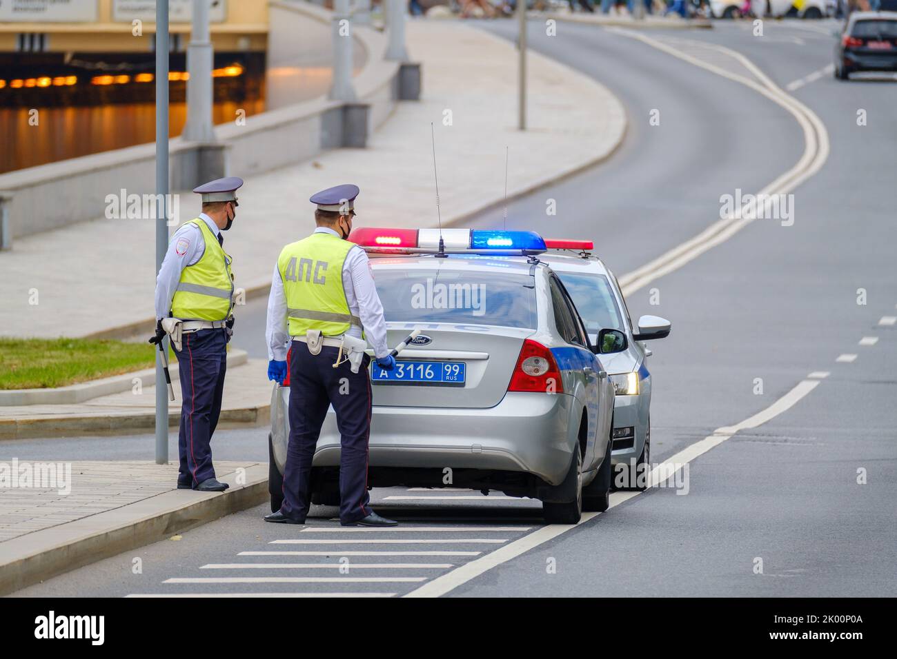 Moscow, Russia - August 6, 2022: Back view of men in traffic police ...