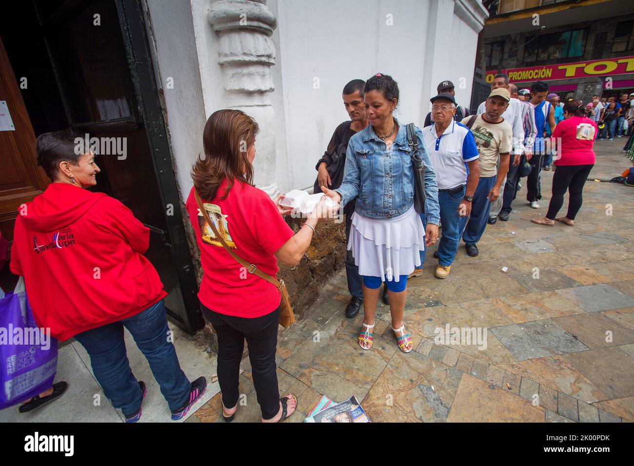 Hand out handing hi-res stock photography and images - Alamy