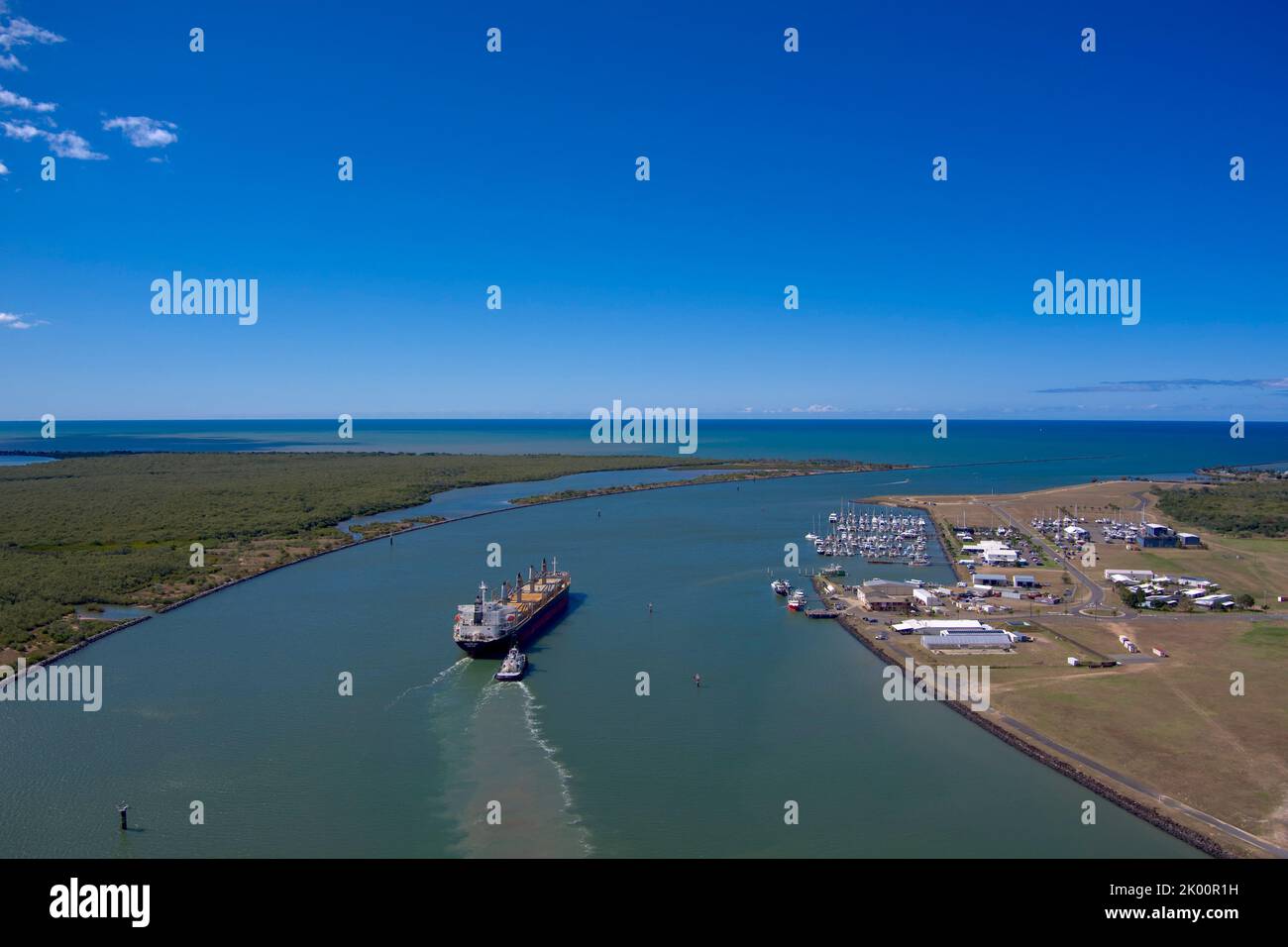 Aerial view of a cargo ship in a river Port Bundaberg Queensland ...